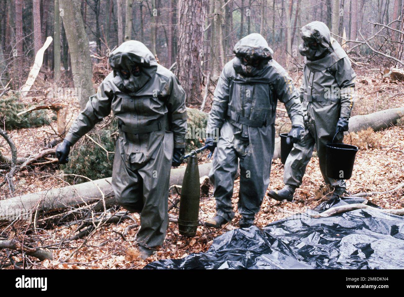 Soldiers wearing Nuclear-Biological-Chemical (NBC) protective suits and ...