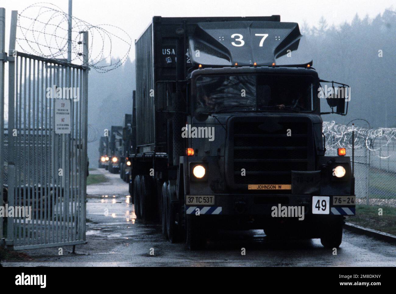 A convoy of 37th Transportation Company M915A1 14-ton tractor trucks ...