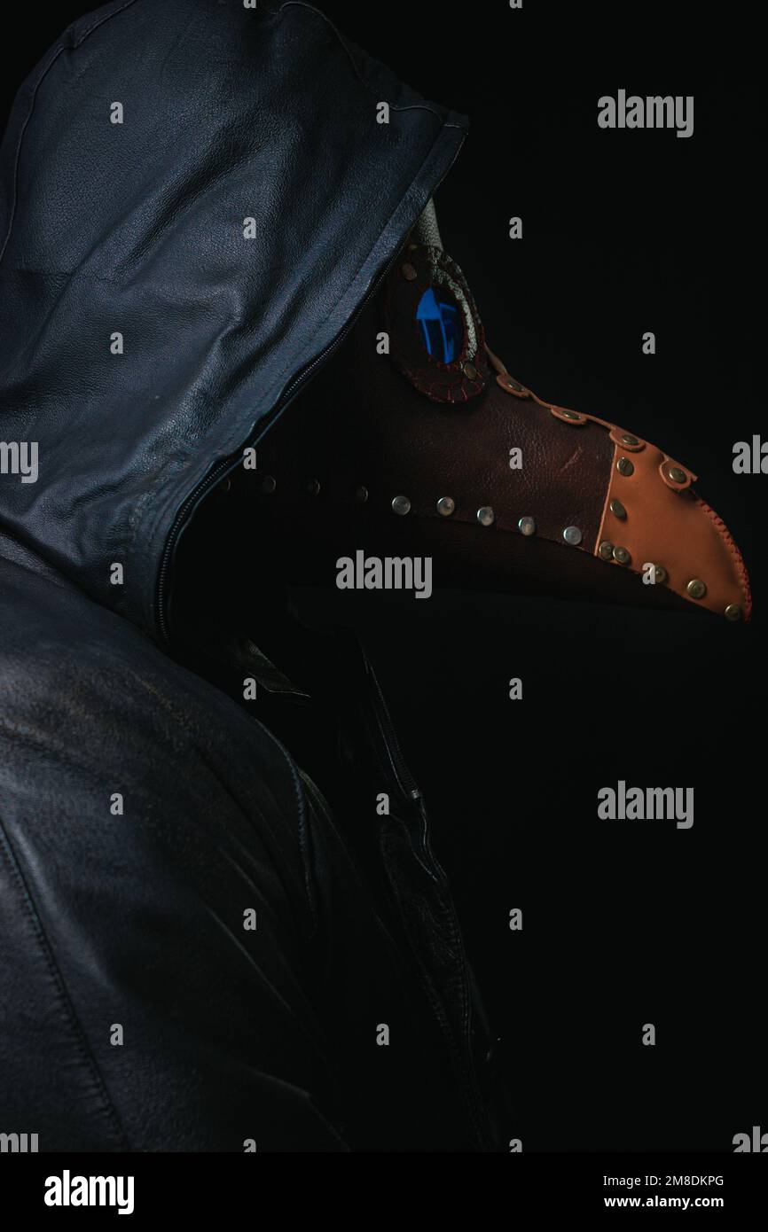 Plague doctor with crow-like mask isolated on black background Creepy ...