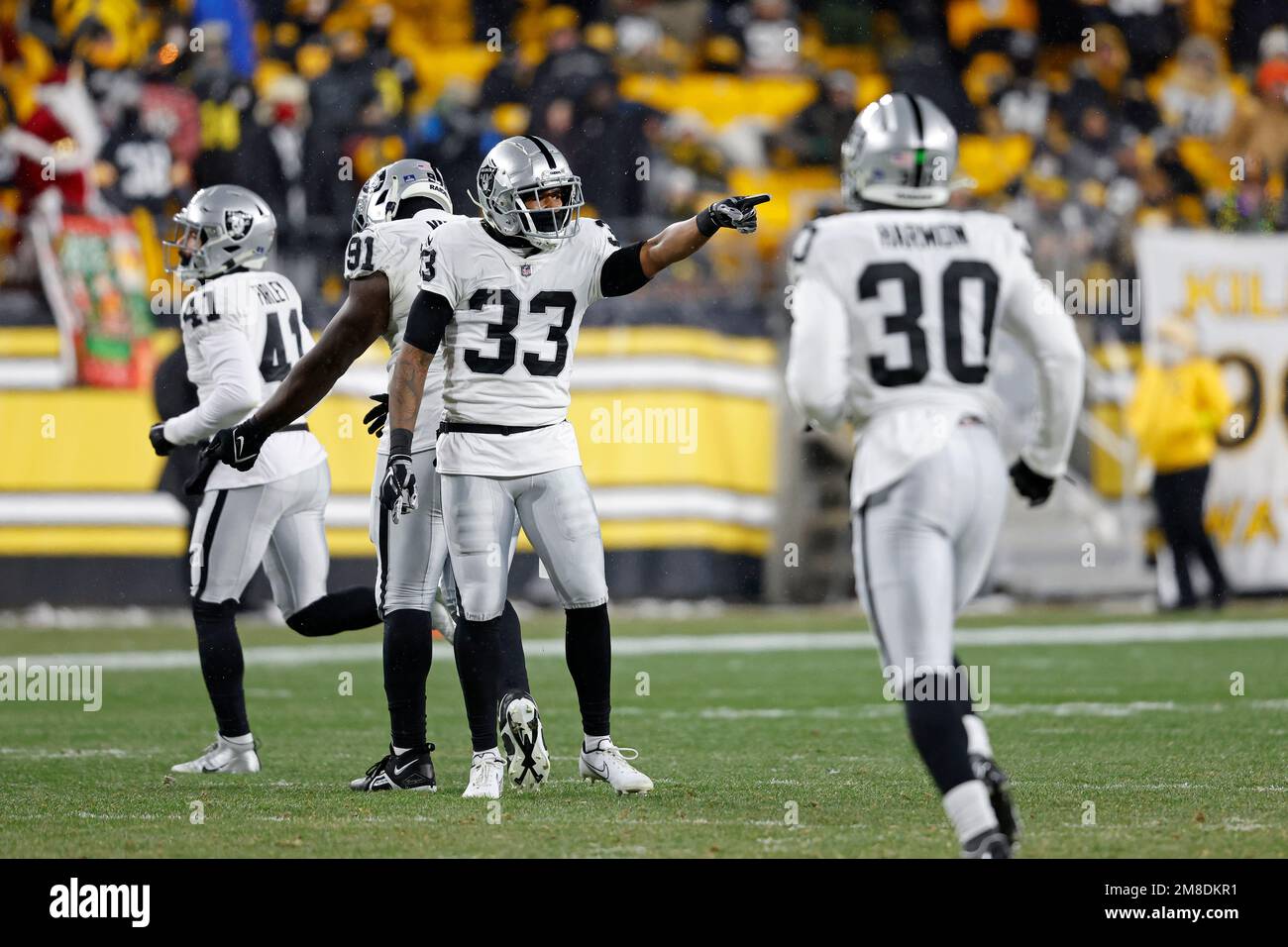 Las Vegas Raiders safety Roderic Teamer (33) reacts to a play during an ...