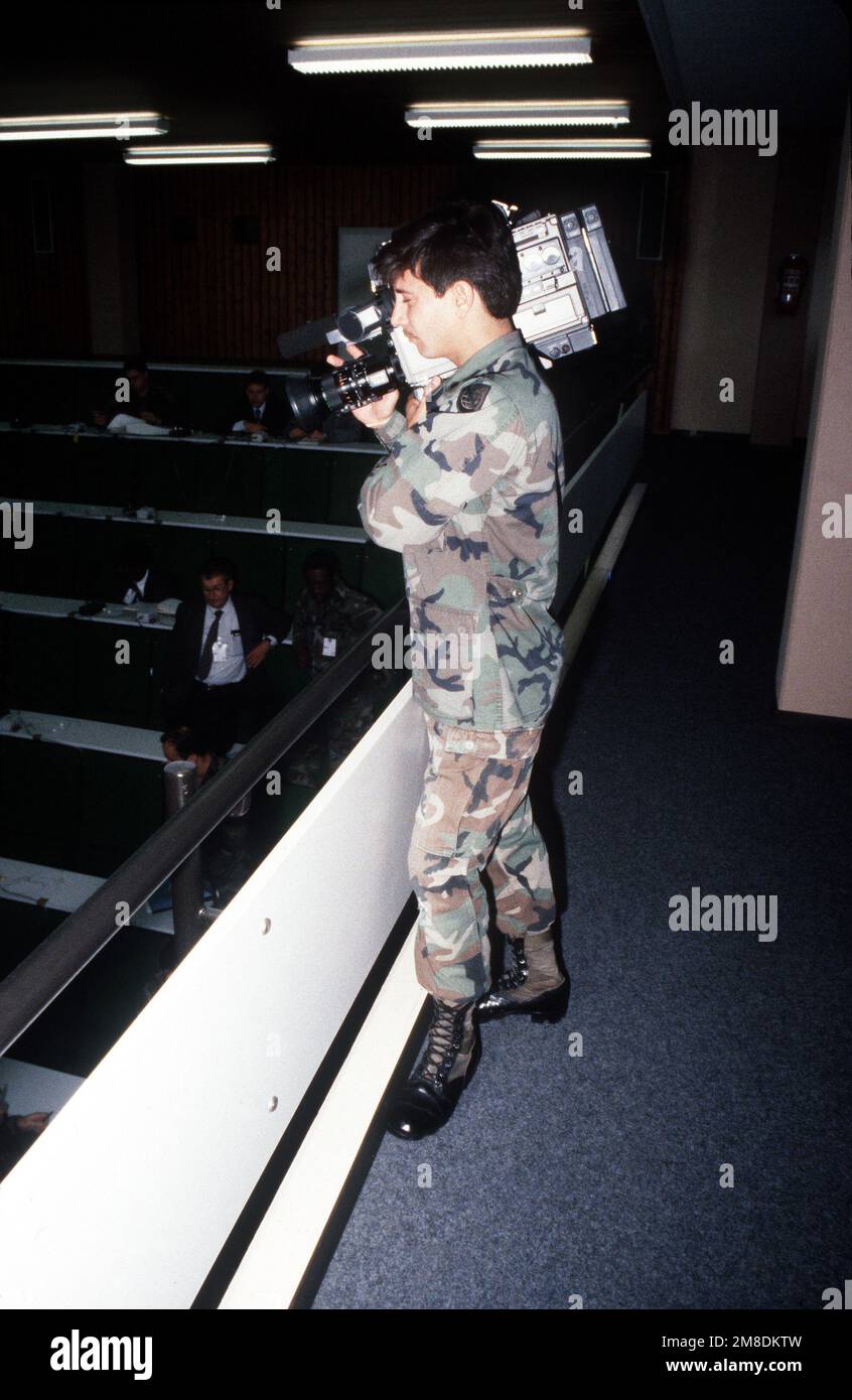 An Army video cameraman films a planning conference for Operation ...