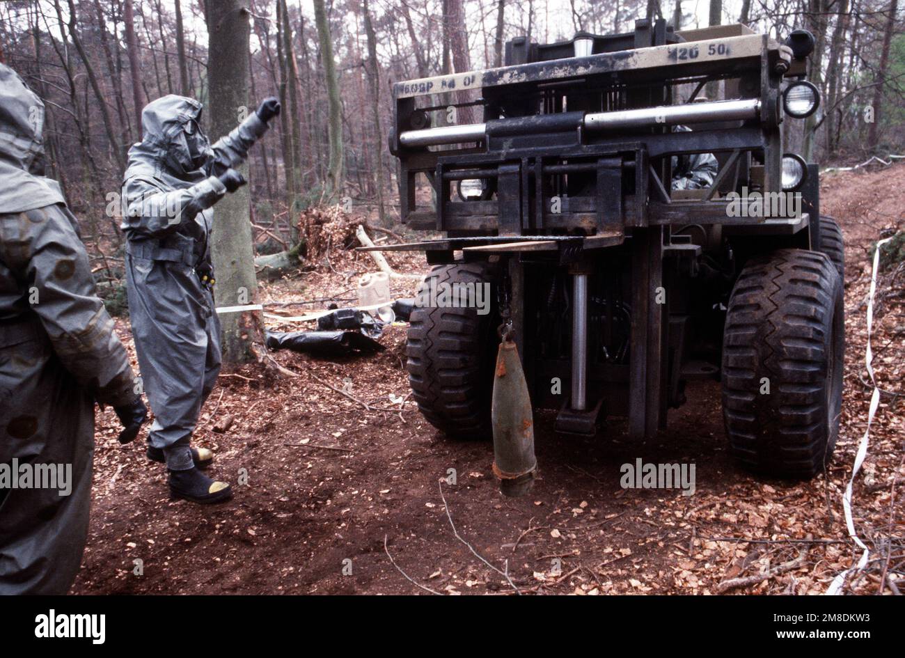 A soldier wearing nuclear-biological-chemical (NBC) protective suit and ...