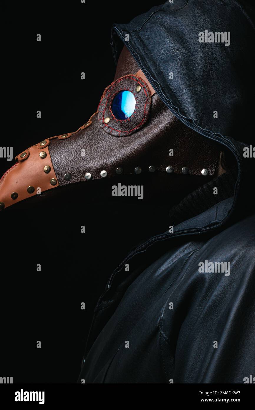Plague doctor with crow-like mask isolated on black background Creepy ...