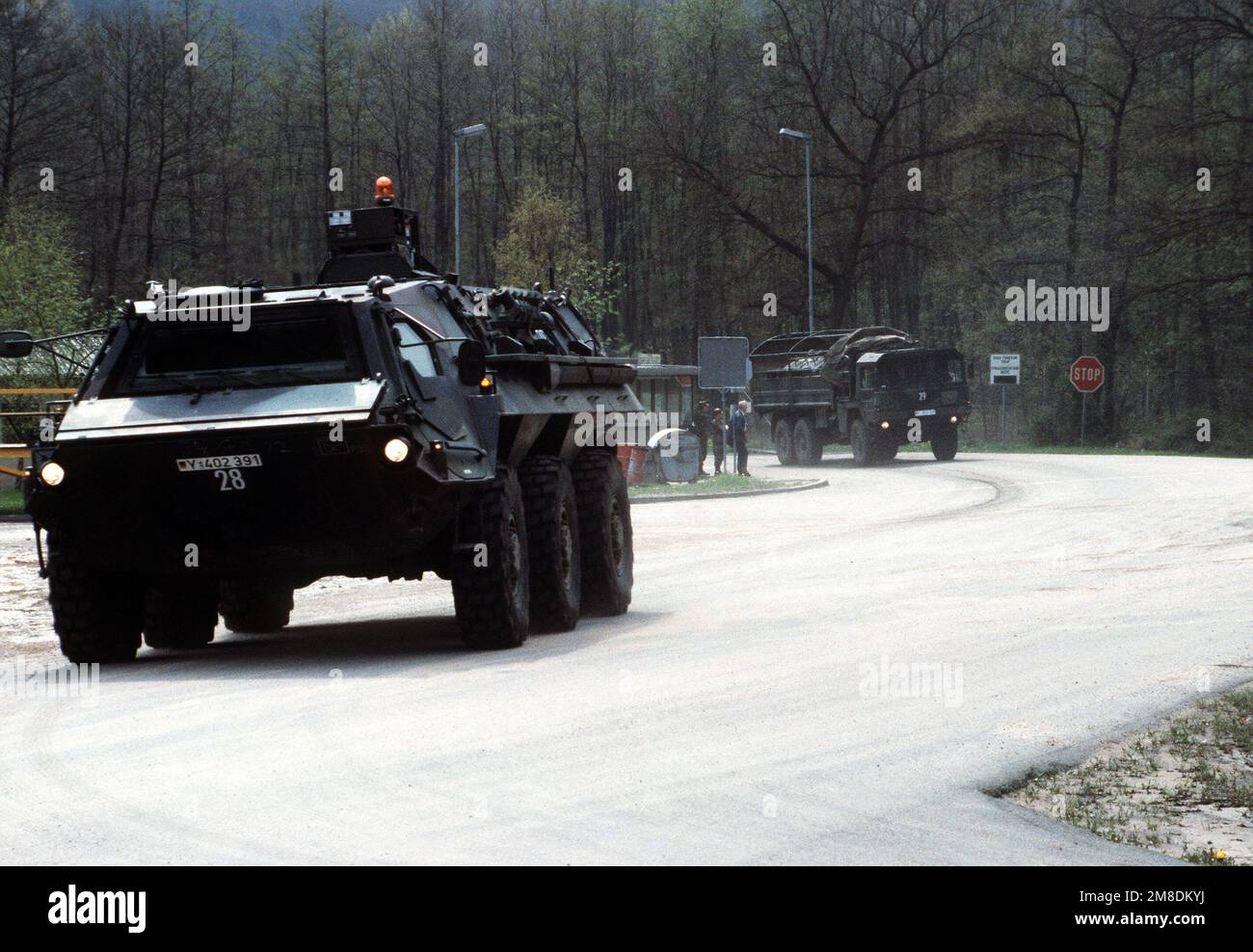 A West German Transportpanzer 1 armored personnel carrier precedes a ...