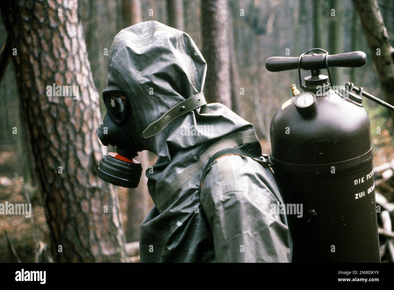 A West German soldier wearing a nuclear-biological-chemical (NBC ...