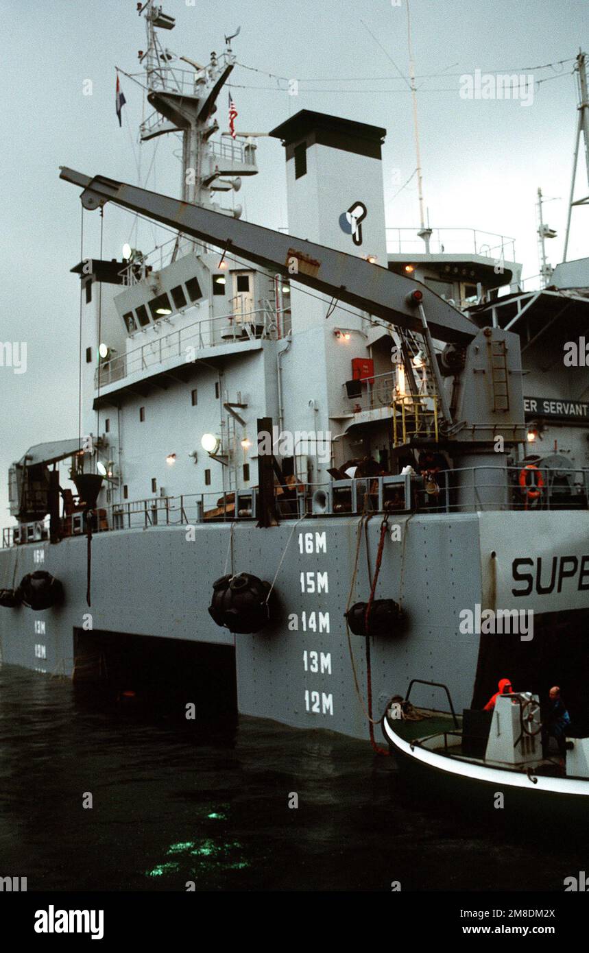 Water level markings on the hull indicate the depth of immersion of the ...