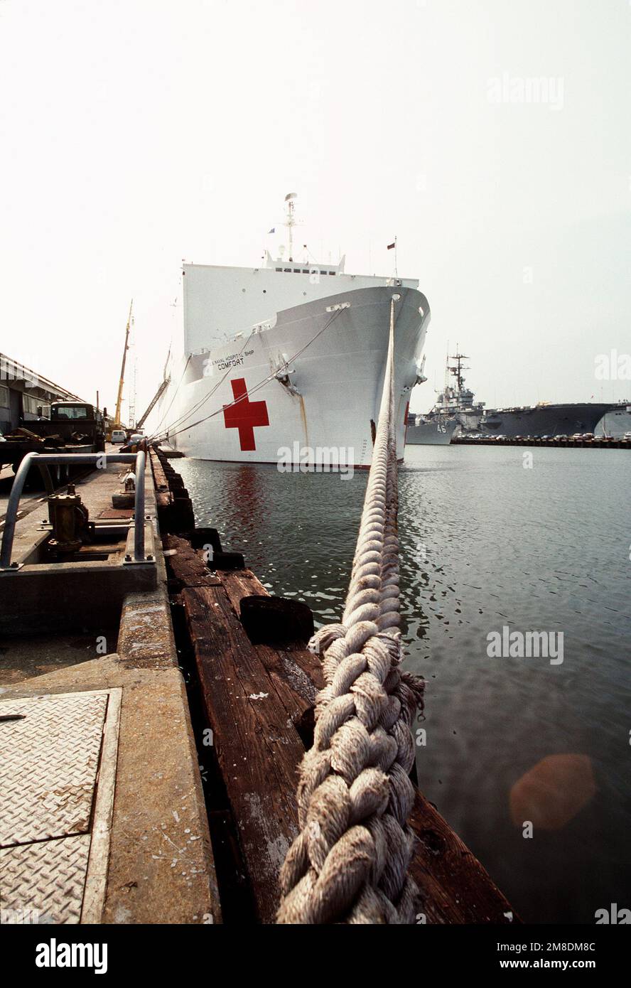 The hospital ship USNS COMFORT (T-AH-20) is moored to a pier prior to ...