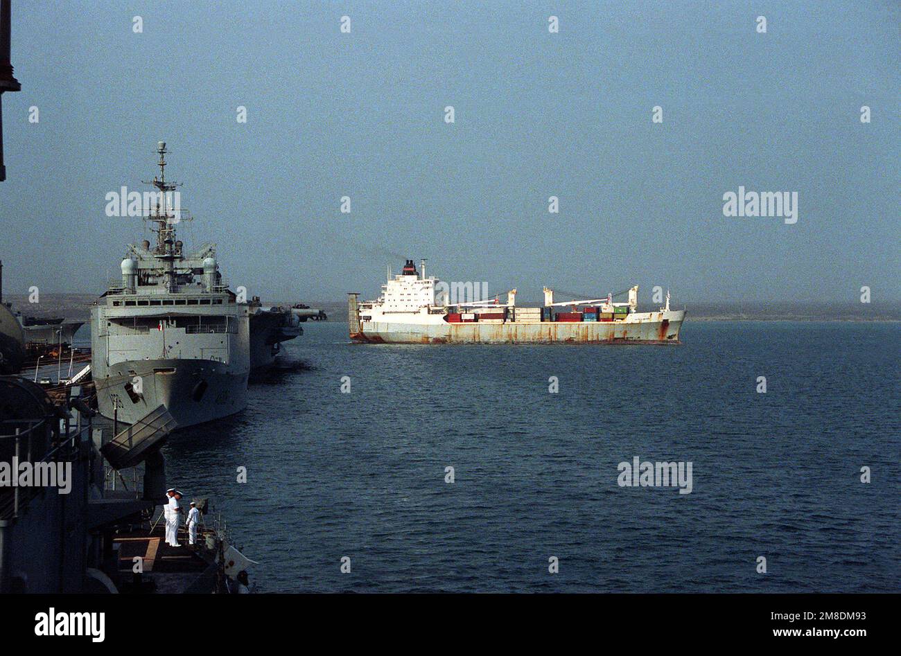 The French underway replenishment tanker FS VAR (A-608), left, is ...