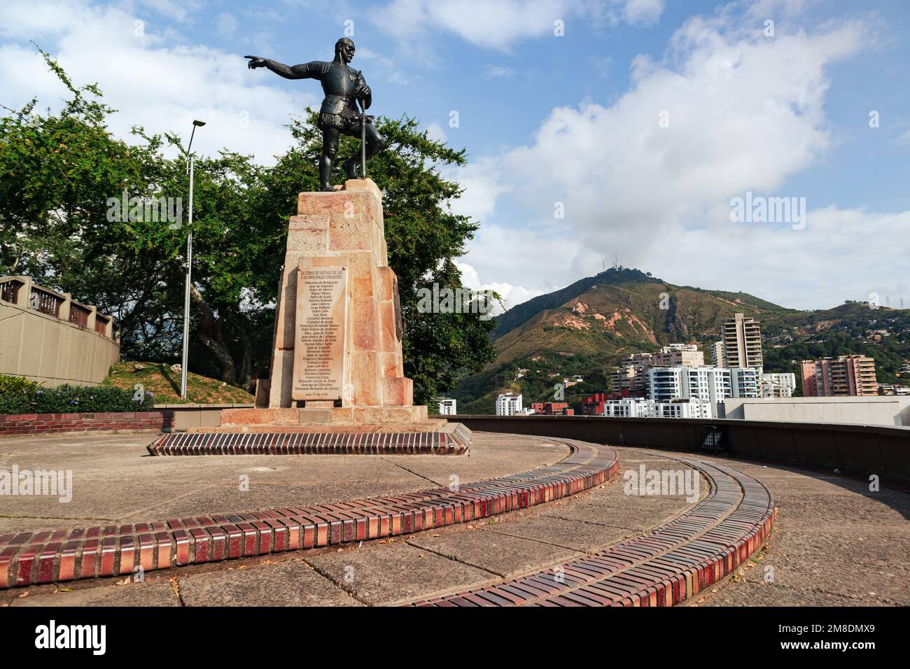 Bronze statue of Sebastian de Belalcazar against the Santiago de Cali ...