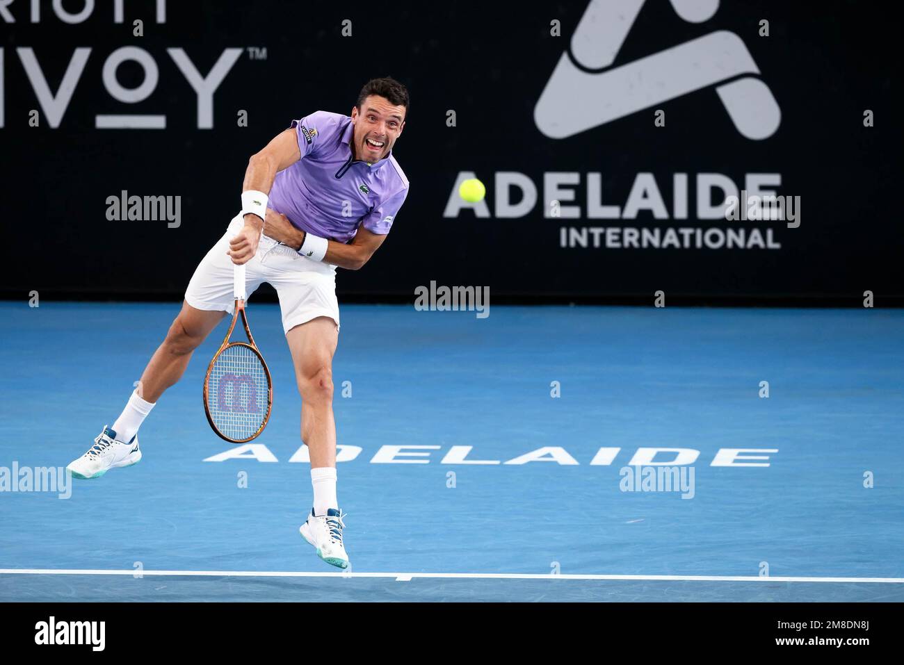 Adelaide, Australia, 13 January, 2023. Roberto Bautista Agut of Spain serves the ball during the ...