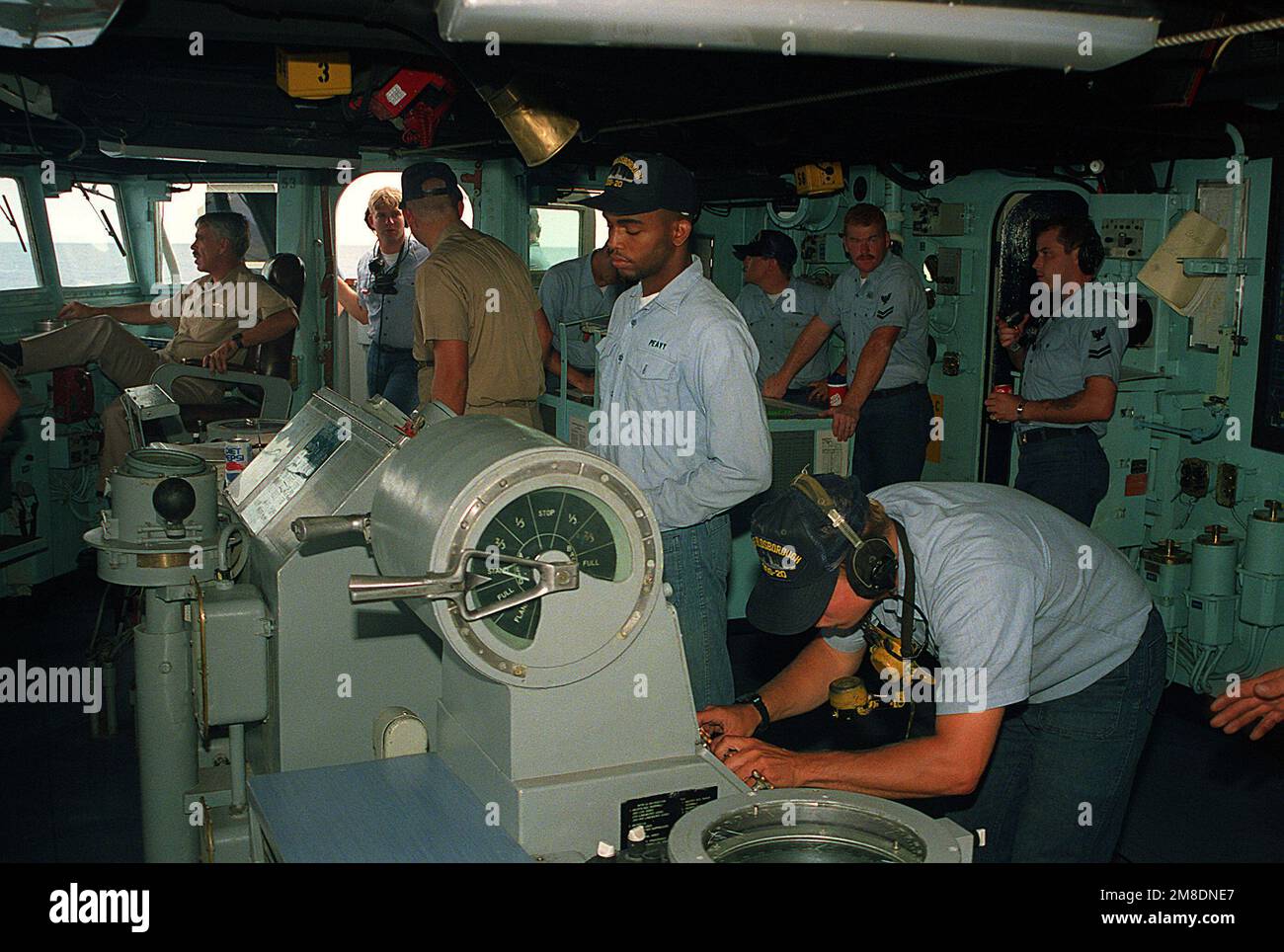CAPT. Reid and crew members of the guided missile destroyer USS ...