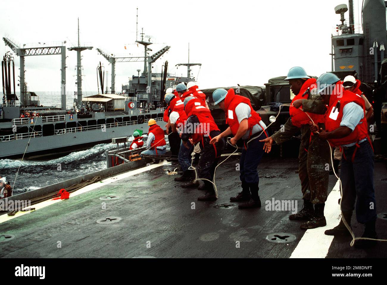 Crew members aboard the amphibious transport dock USS DUBUQUE (LPD-8 ...