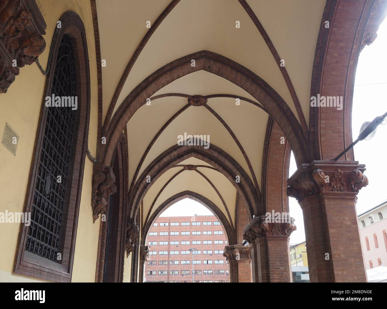 ancient gothic colonnade portico in Bologna, Italy Stock Photo - Alamy