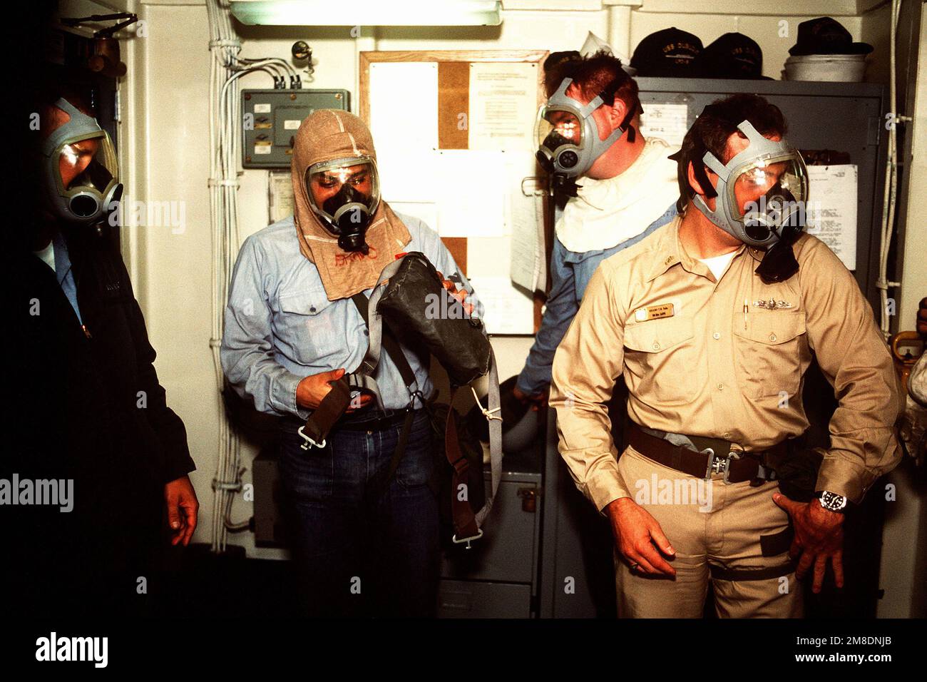 Crew members aboard the amphibious transport dock USS DUBUQUE (LPD-8 ...