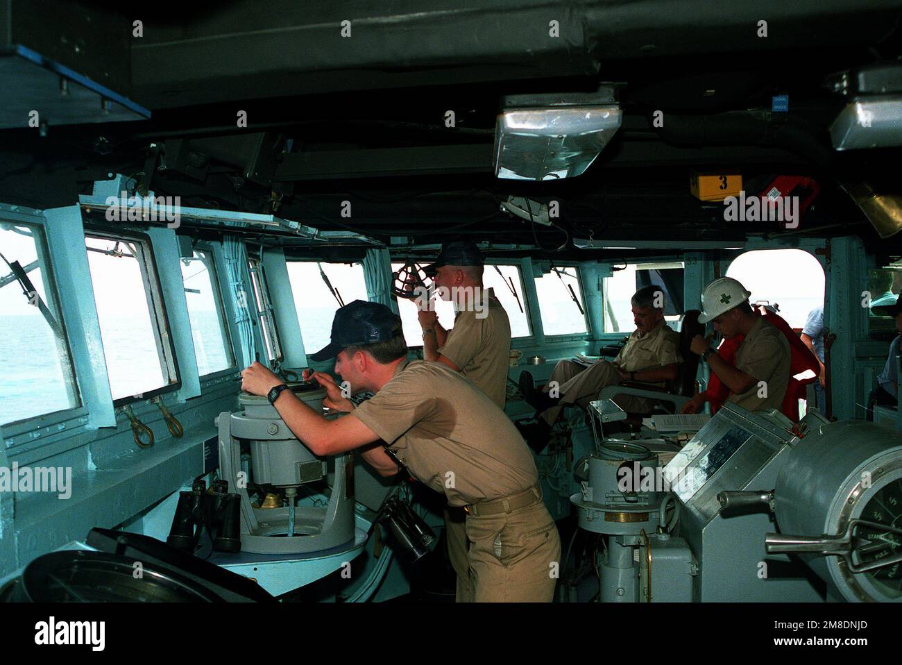 CAPT. Reid and officers on the bridge navigate the guided missile ...