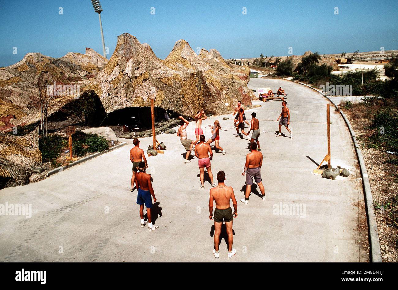 U.S. military personnel occupy their spare time playing sports during ...