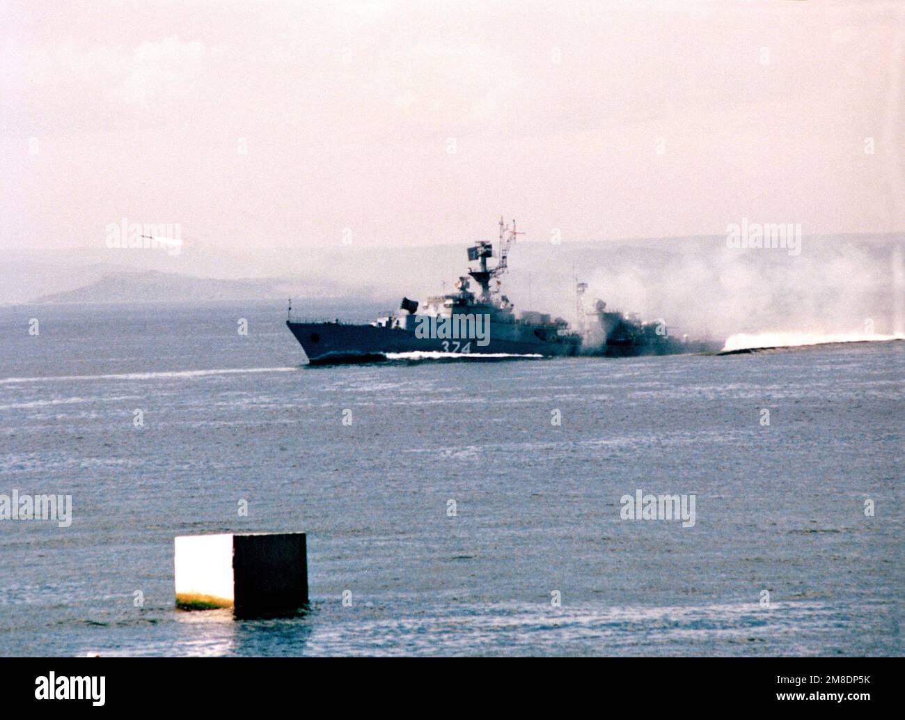 A Soviet Grisha V class light frigate fires a rocket from one of its ...