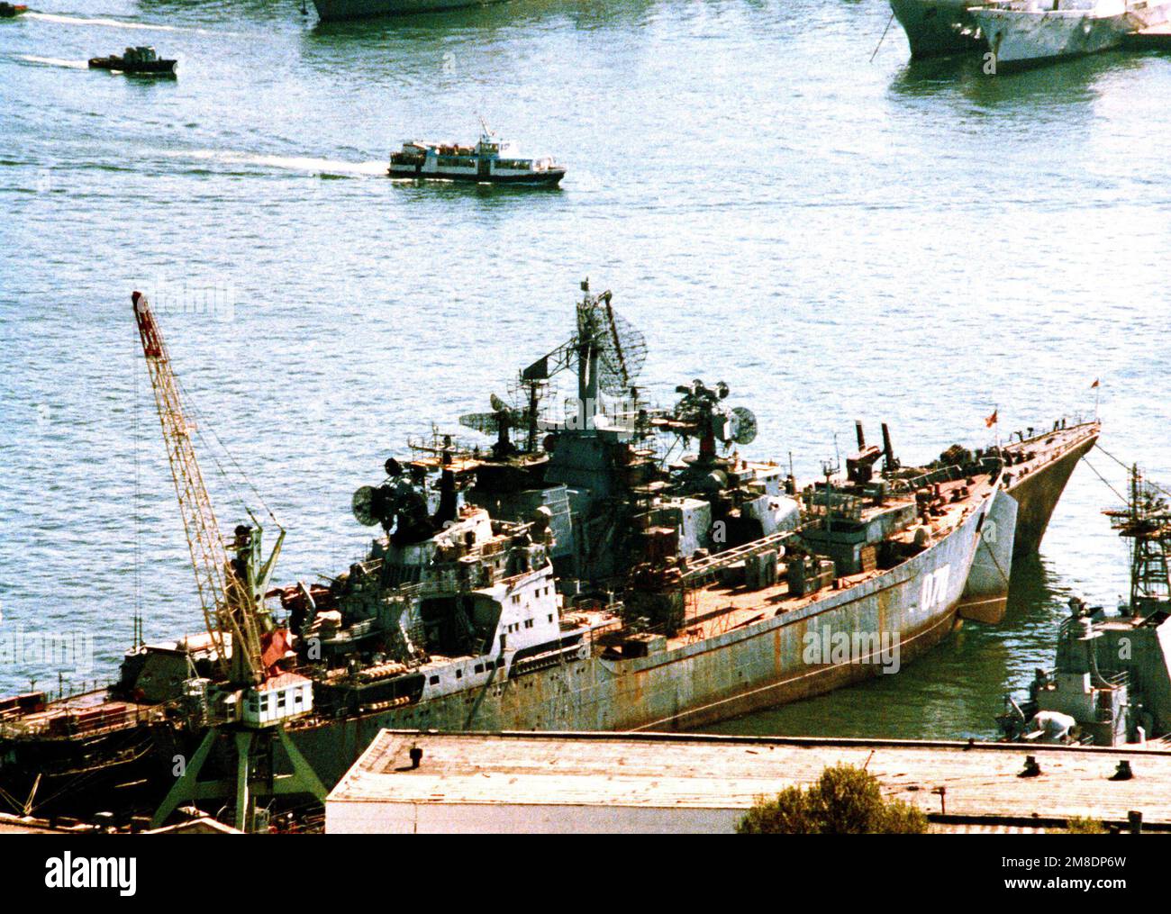 A Soviet Alligator class tank landing ship, foreground, and a Soviet ...