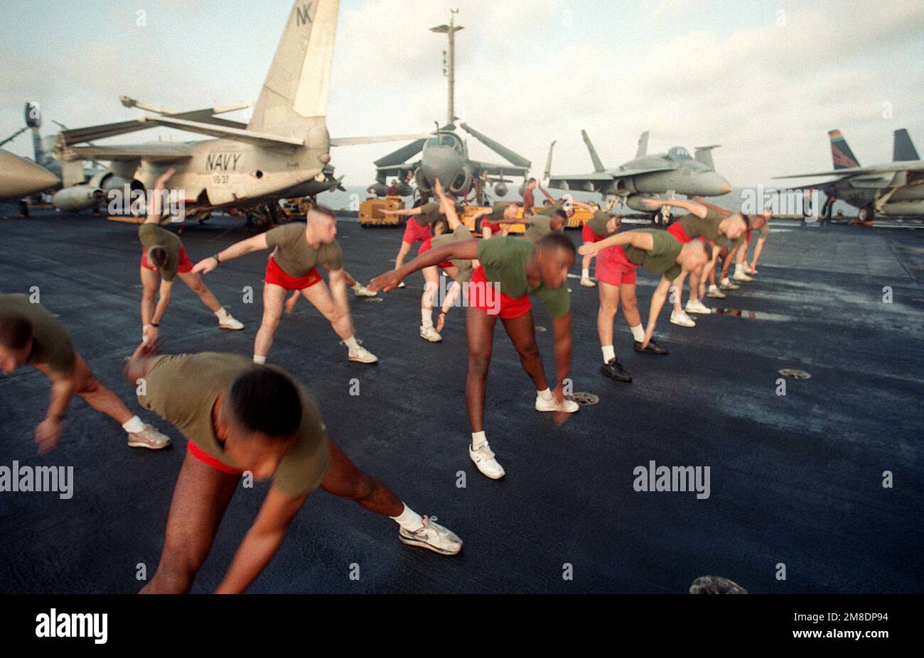 Members of the Marine detachment aboard the aircraft carrier USS ...