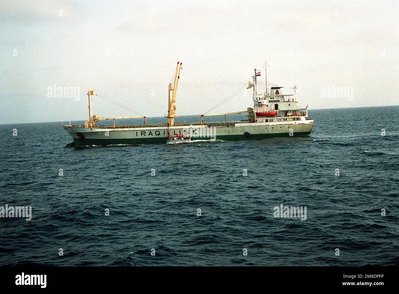 Members of a boarding team from the guided missile destroyer USS ...