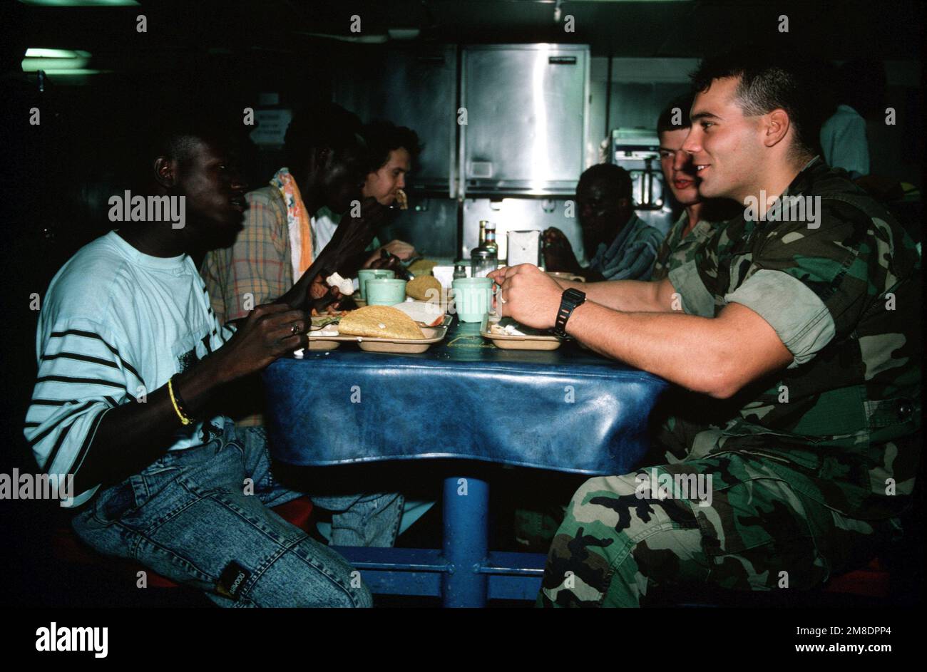 Two Marines in the enlisted dining facility aboard the tank landing ...