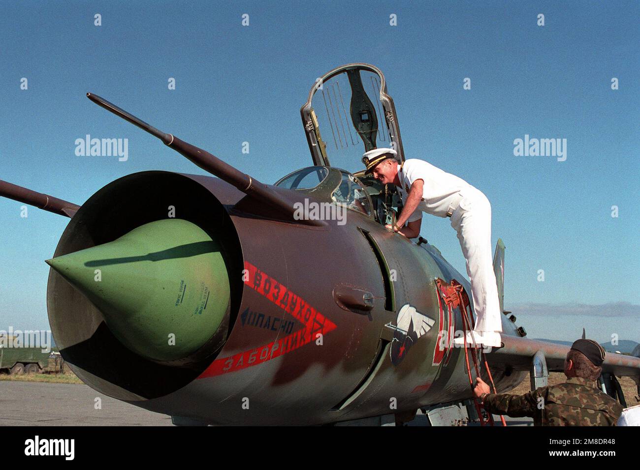 Admiral Charles R. Larson, Commander in CHIEF, US Pacific Fleet, looks ...