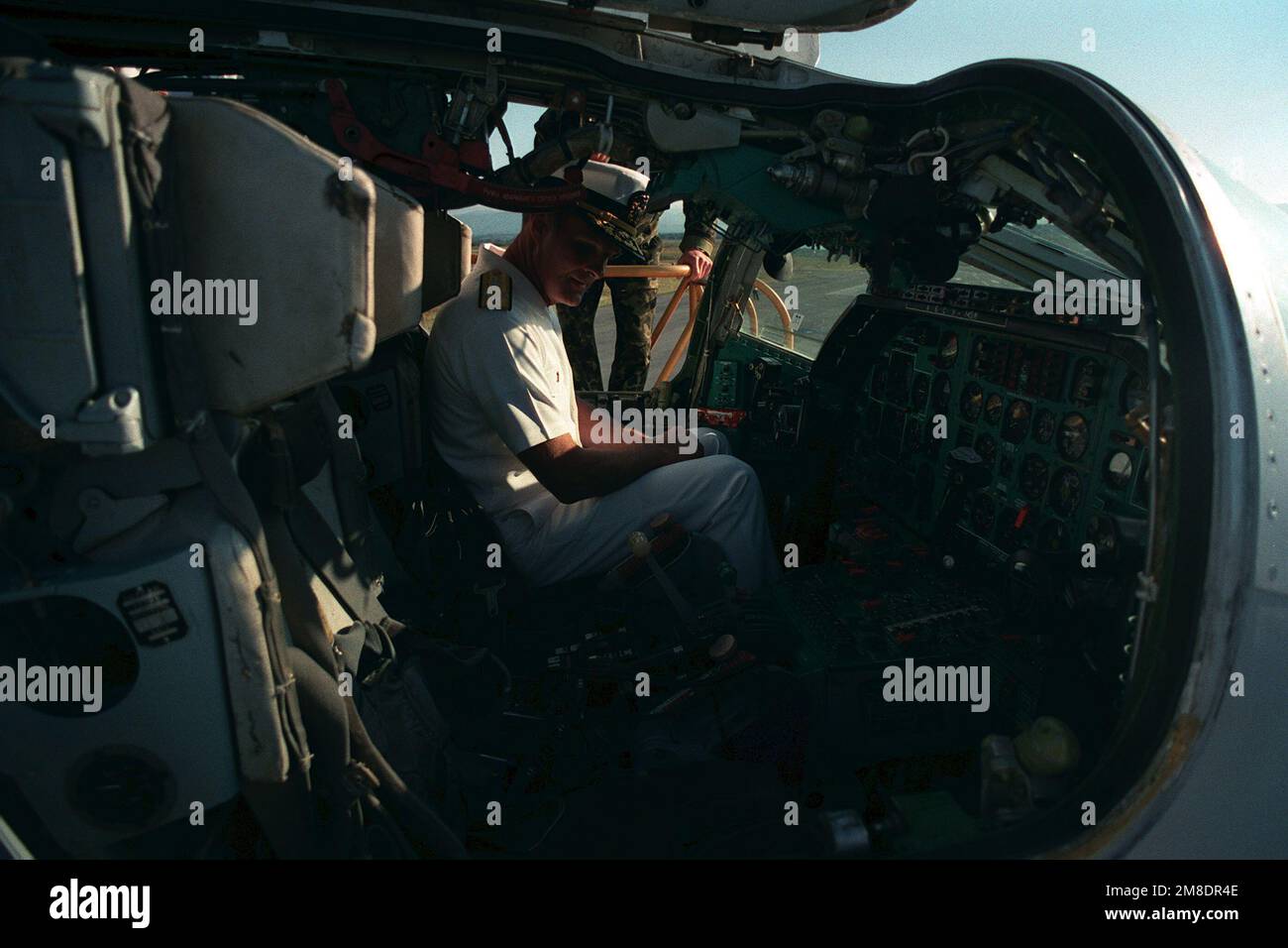 Admiral Charles R. Larson, Commander in CHIEF, US Pacific Fleet, sits ...