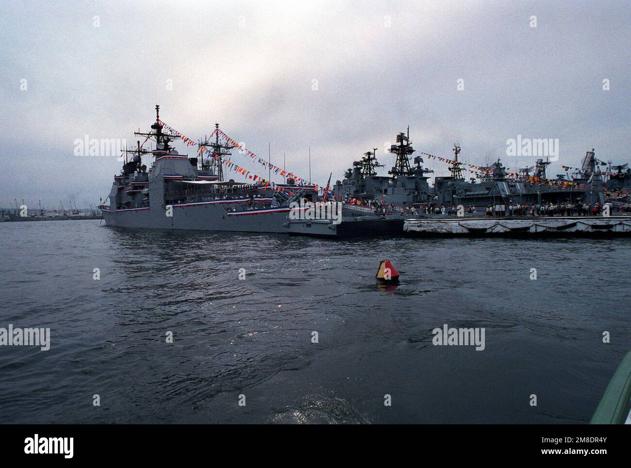 The guided missile cruiser USS PRINCETON (CG 59), left, and the guided ...