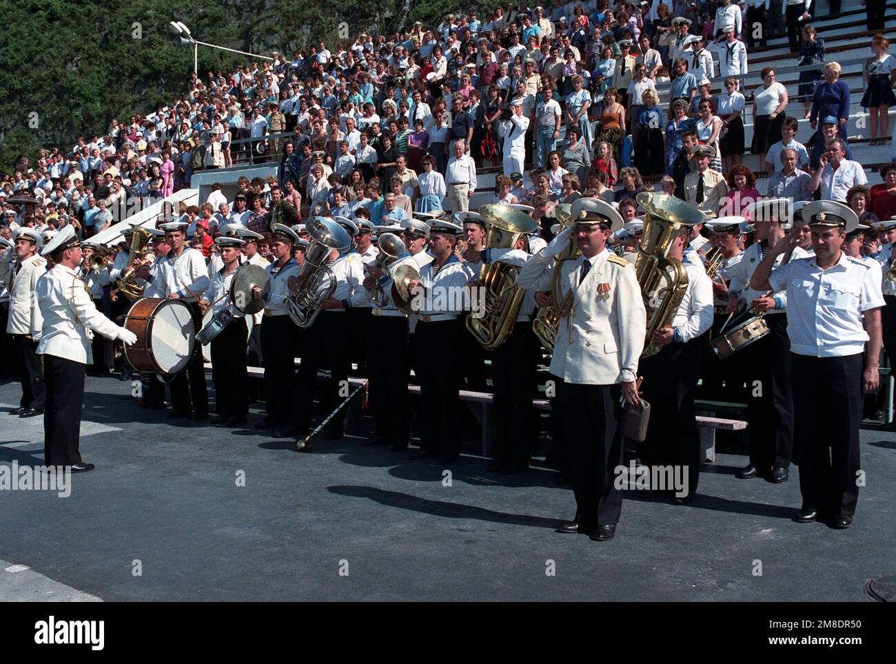 A Soviet navy band plays as the colors are paraded at a review held ...