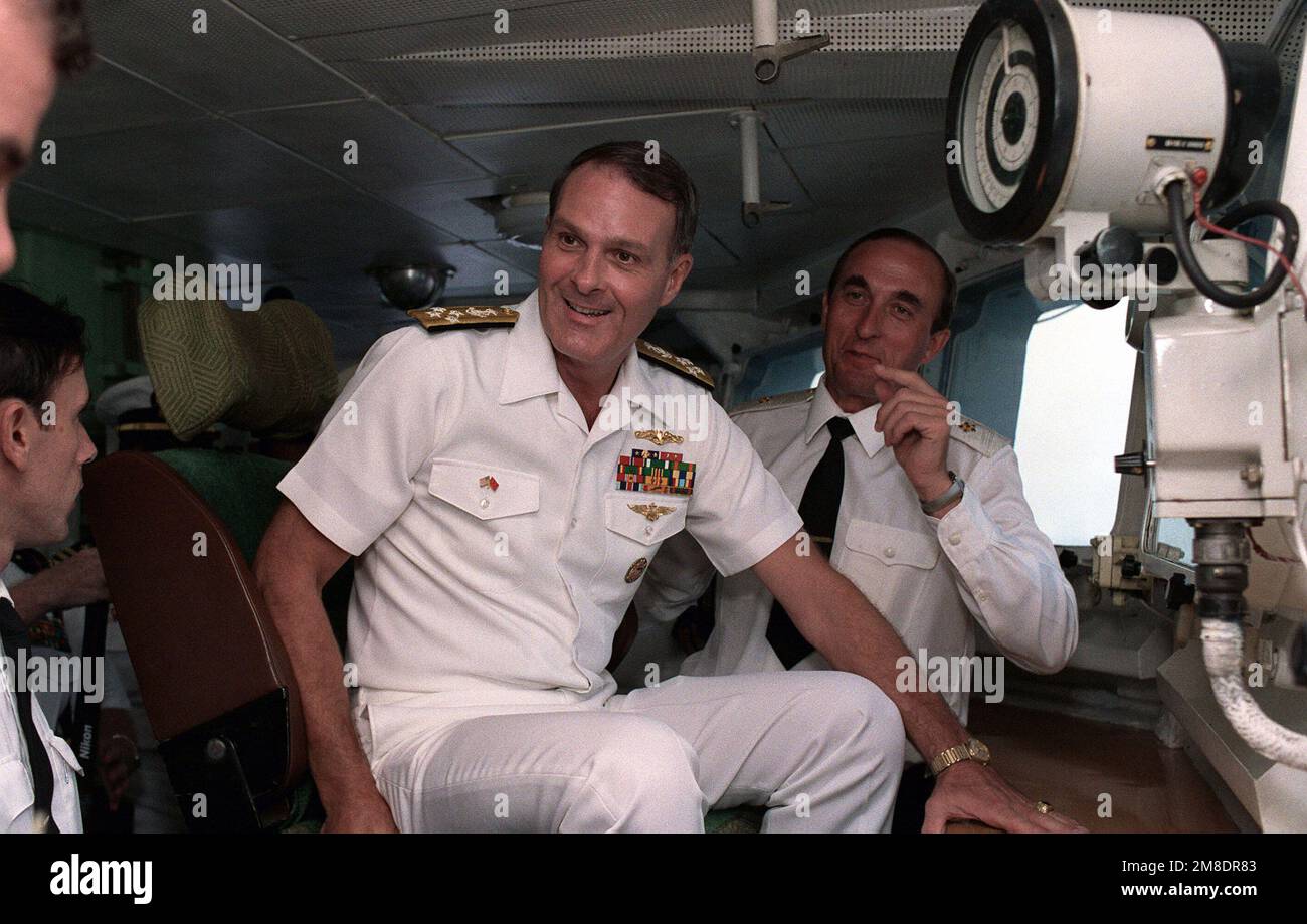 Admiral Charles R. Larson, Commander in CHIEF, US Pacific Fleet, sits ...