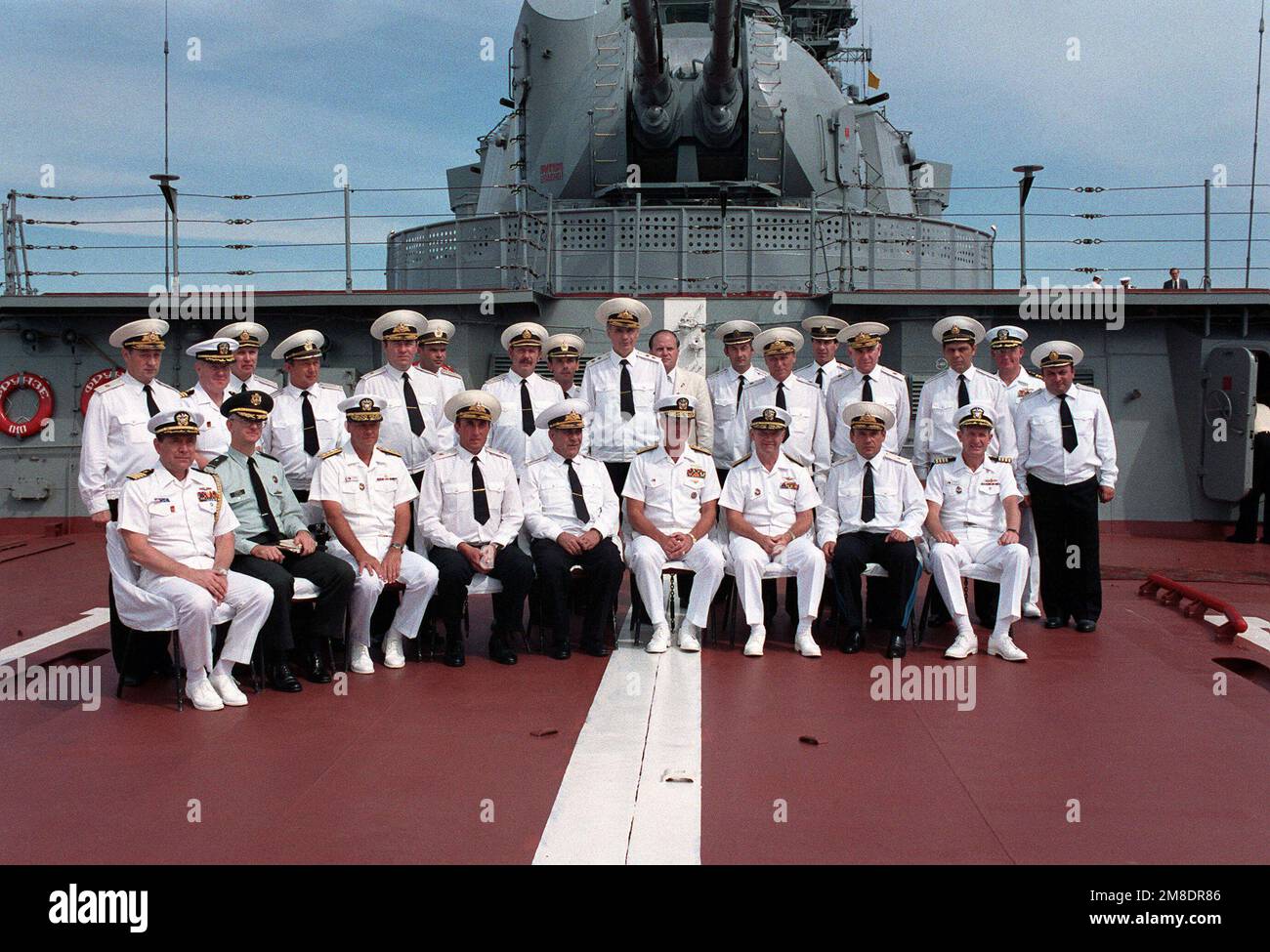 US and Soviet officers gather on the stern of the Soviet nuclear ...
