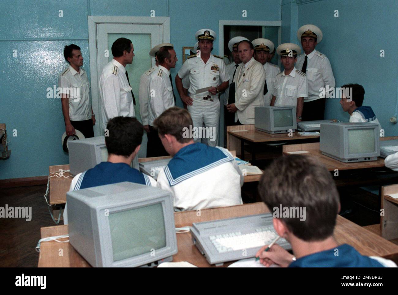 Admiral Charles R. Larson, Commander in CHIEF, US Pacific Fleet, looks ...