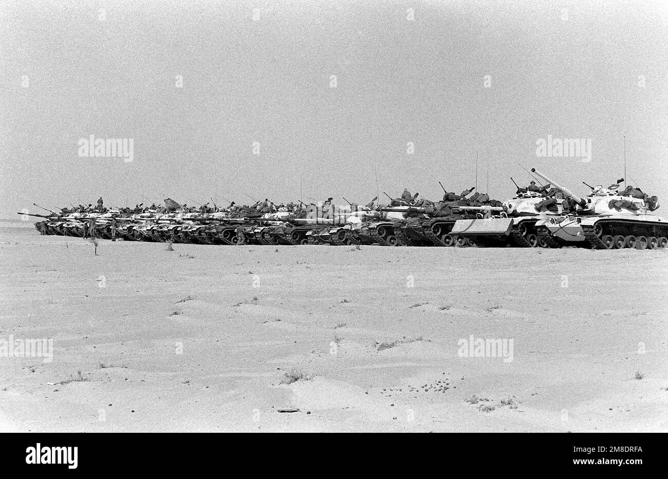 Marines from the 1ST Tank Battalion wait on and around their M-60A1 ...