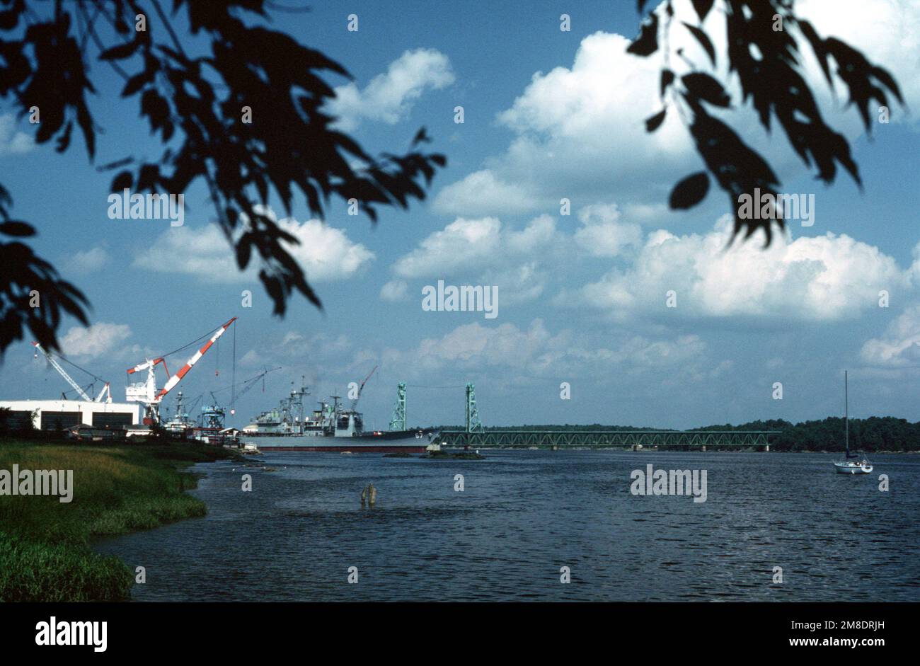 A Ticonderoga class guided missile cruiser under construction rides ...