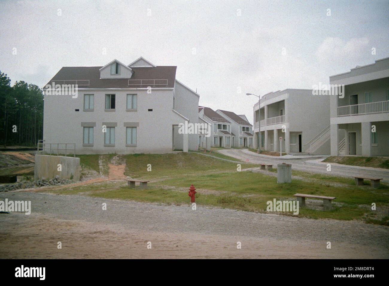 A view of townhouses, left, and apartment buildings in the combat ...