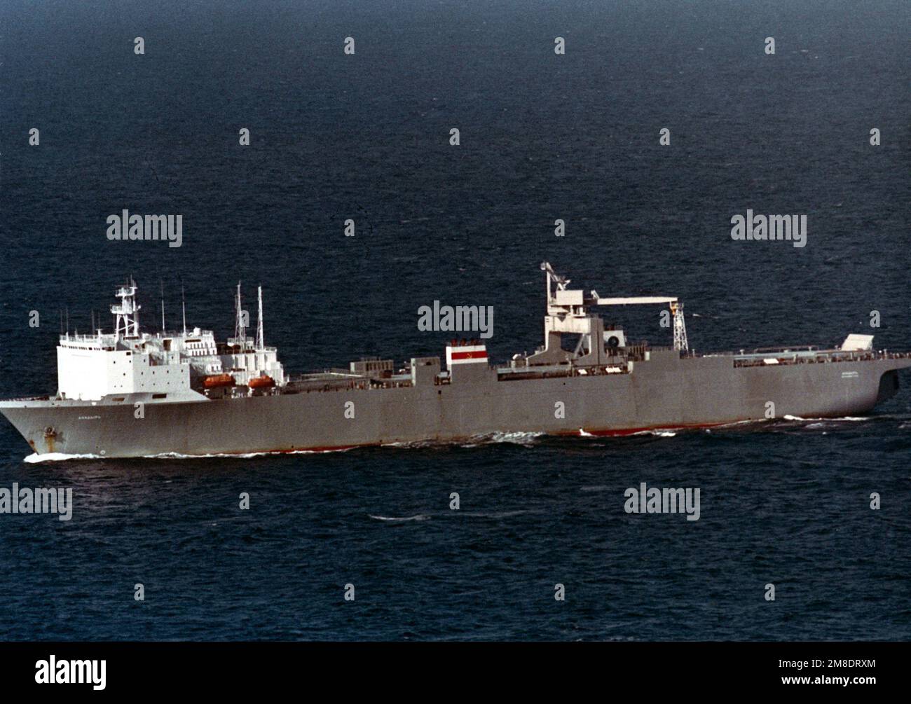 A port view of the Soviet heavy lift cargo ship ANADYR underway. The ...