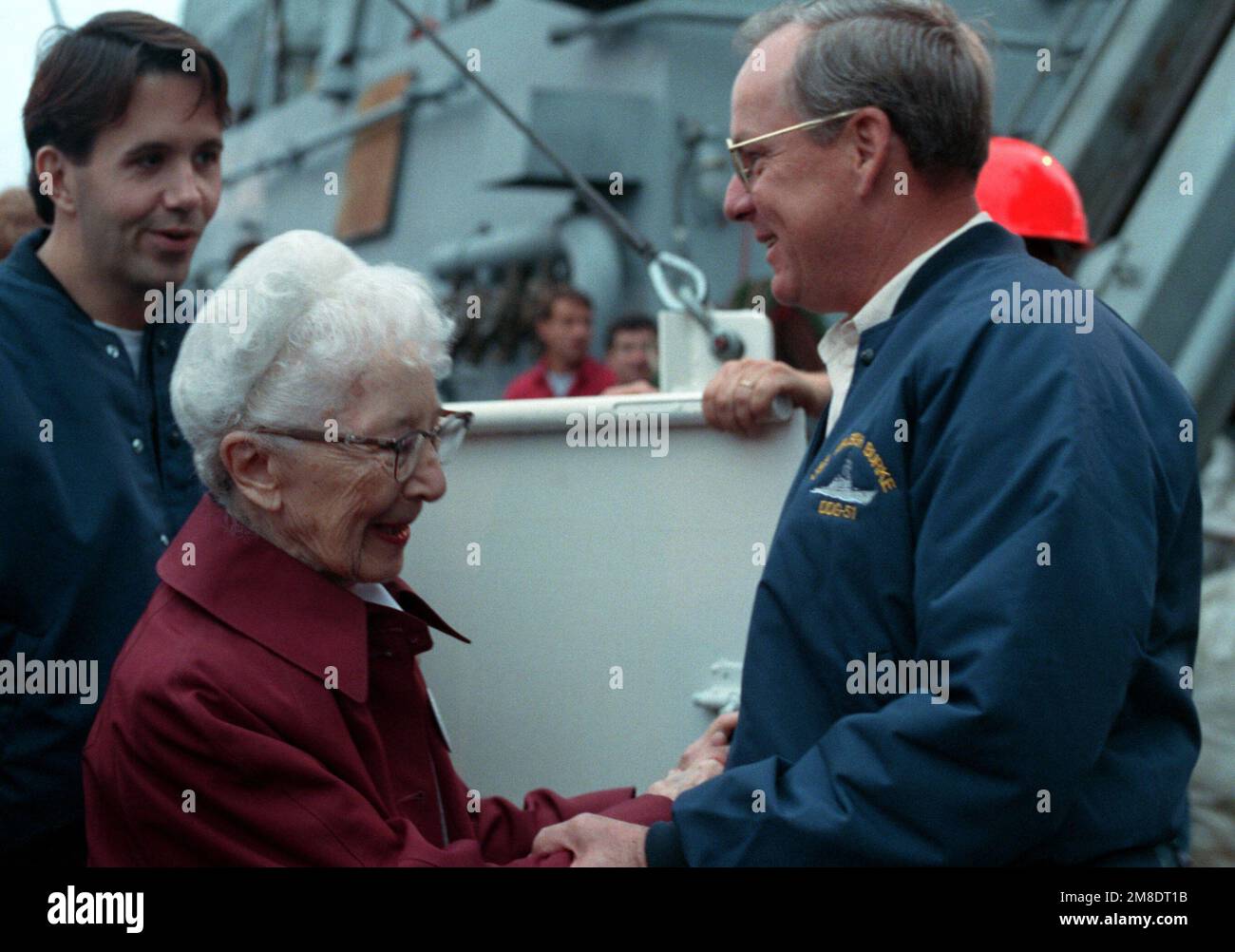 Roberta Burke, wife of retired Admiral Arleigh Burke, greets Secretary ...