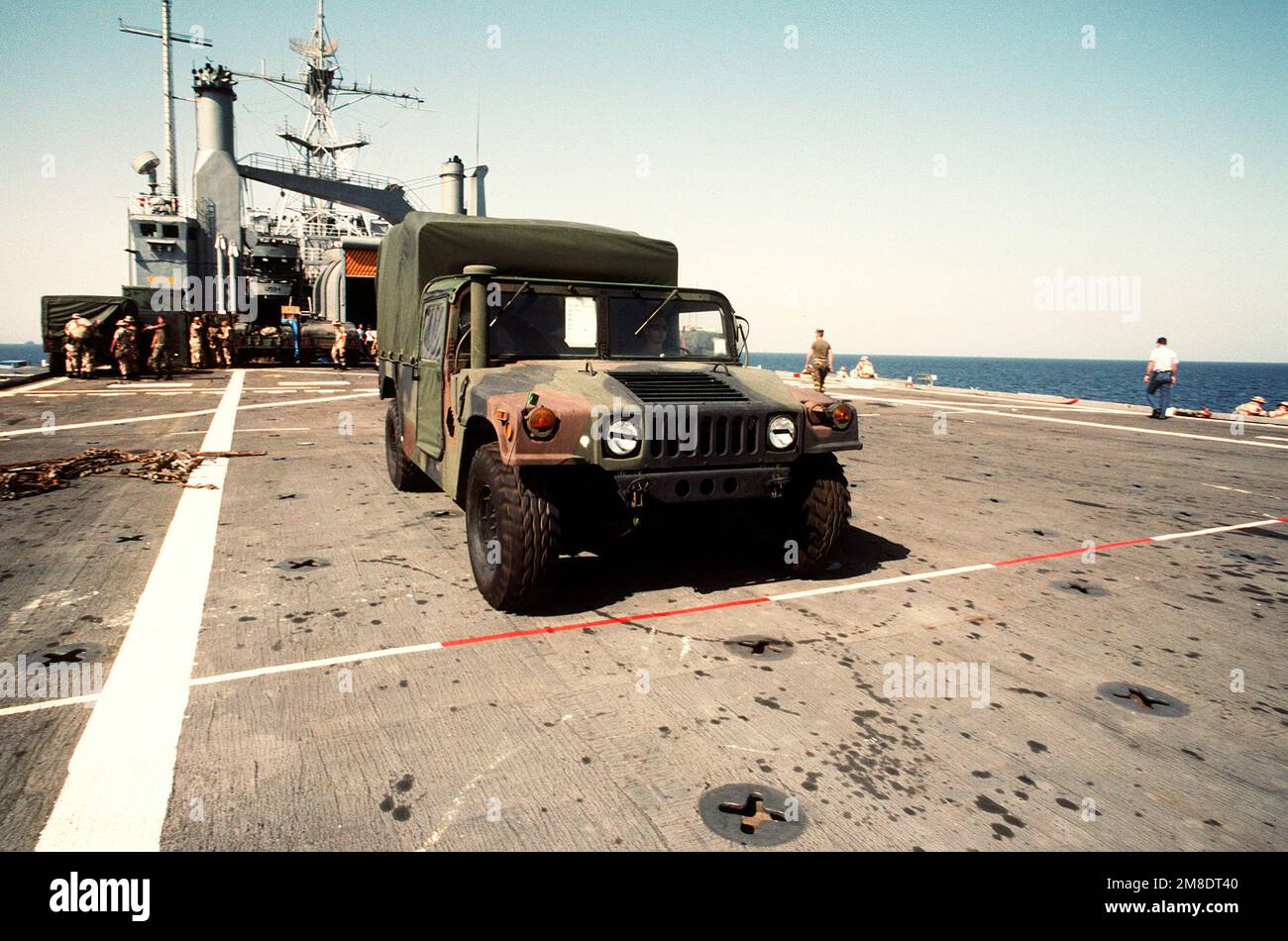 An M998 High-Mobility Multipurpose Wheeled Vehicle (HMMWV) is driven ...