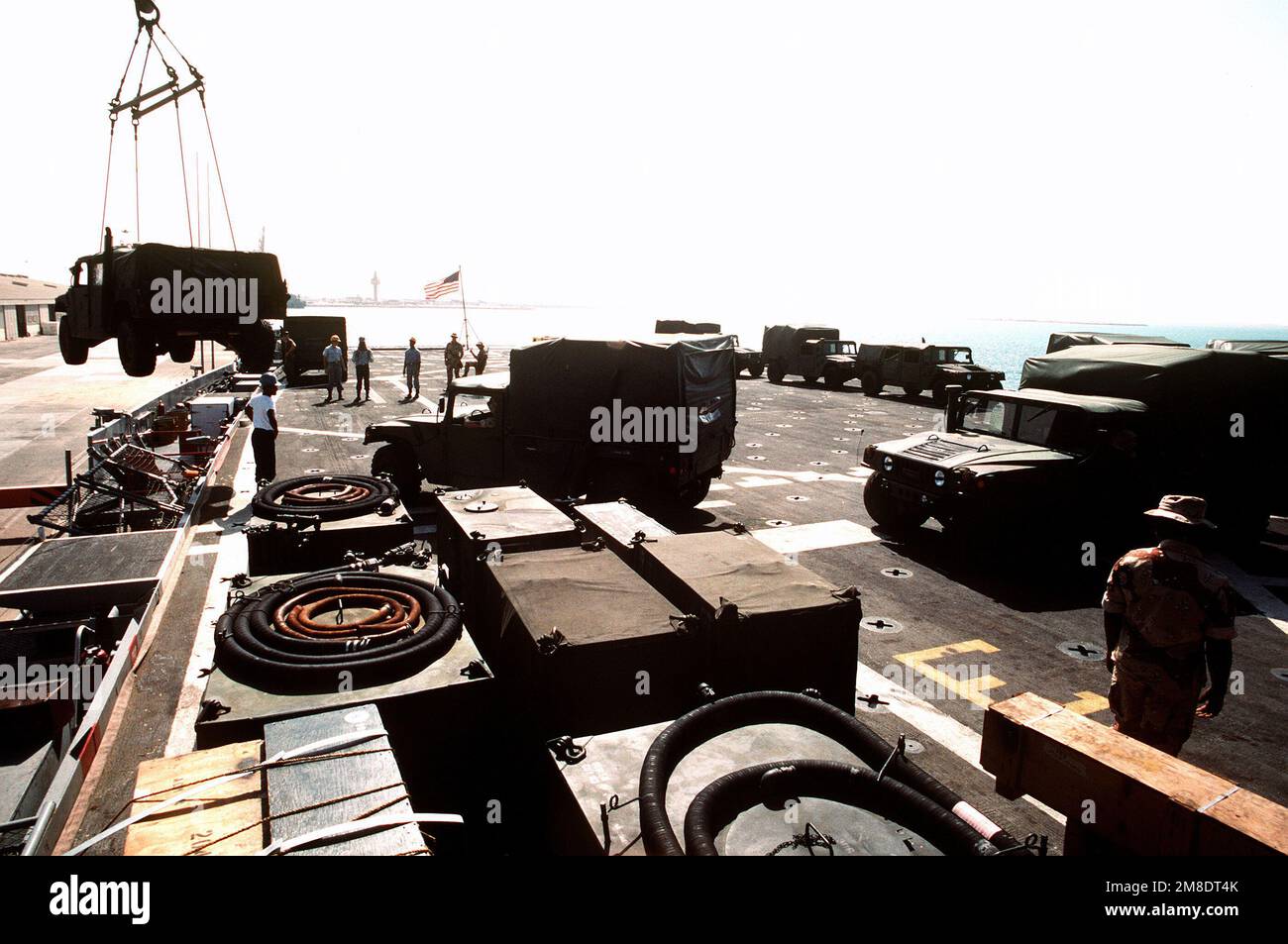 A Marine drives an M998 High-Mobility Multipurpose Wheeled Vehicle ...