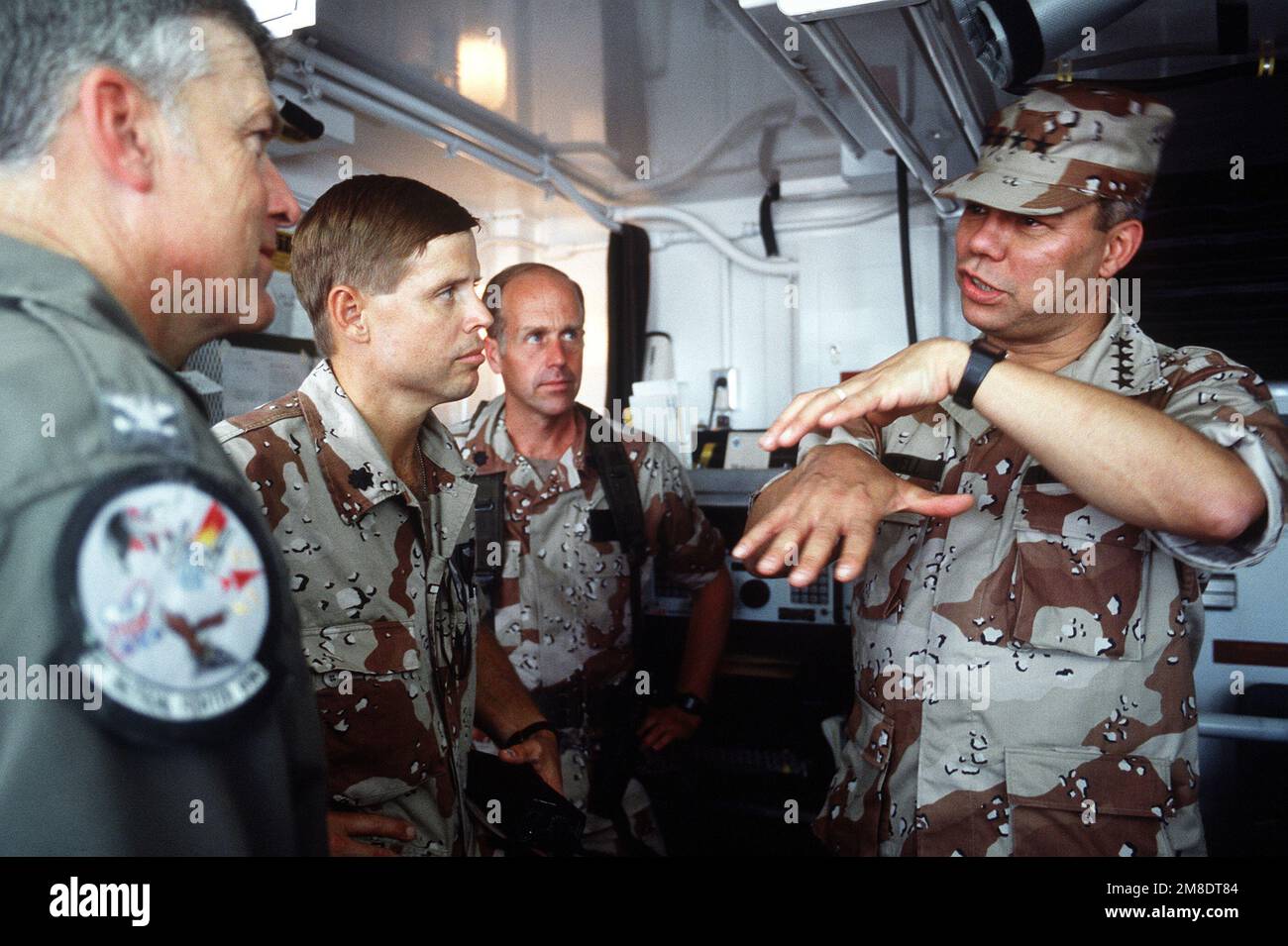 GEN. Colin Powell, chairman of the Joint Chiefs of STAFF, speaks with a ...