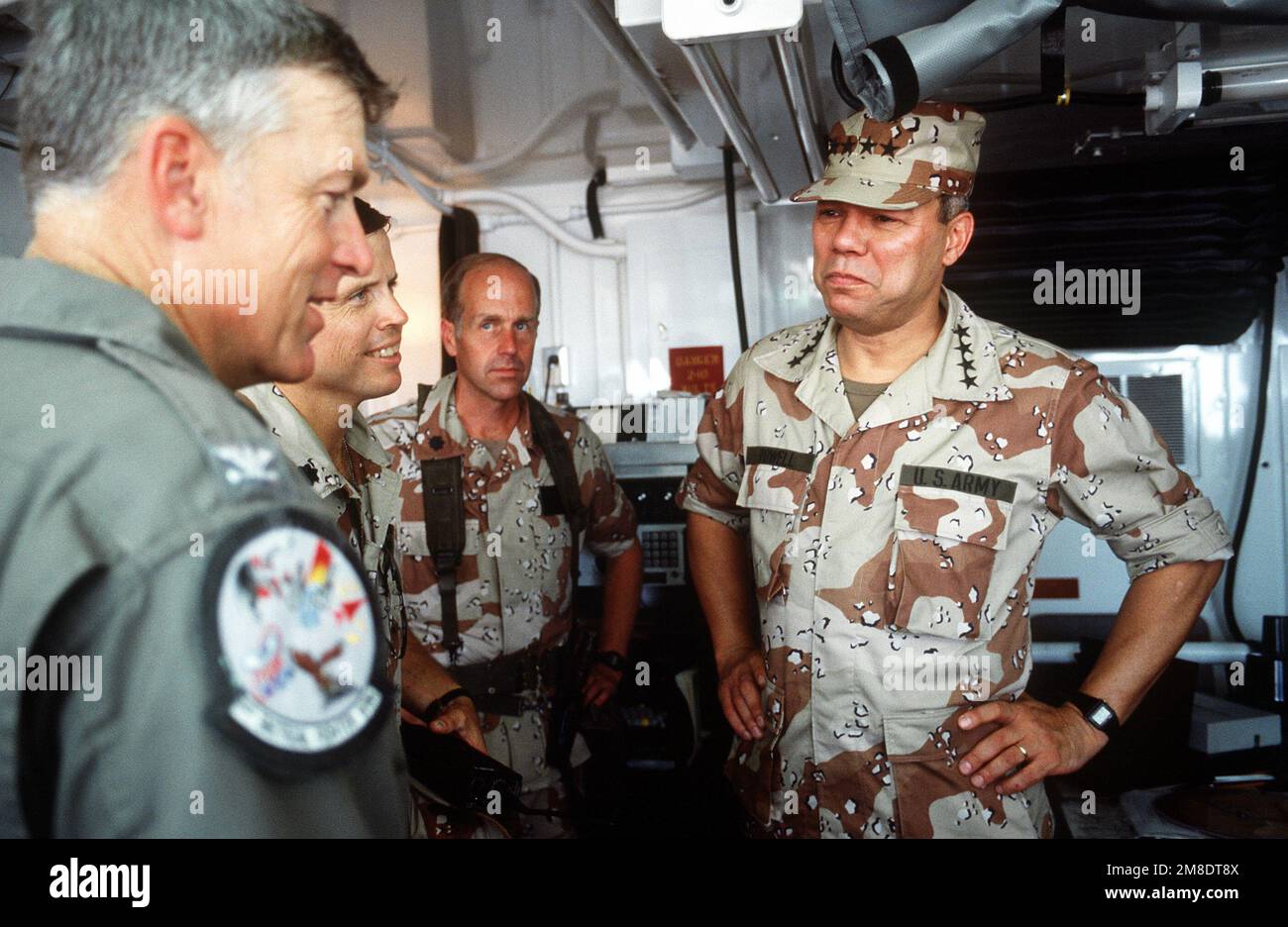 GEN. Colin Powell, chairman of the Joint Chiefs of STAFF, speaks with a ...