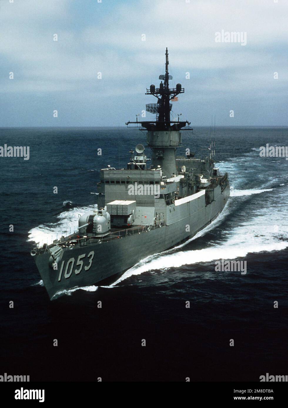 A port bow view of the frigate USS ROARK (FF-1053) underway. Country ...