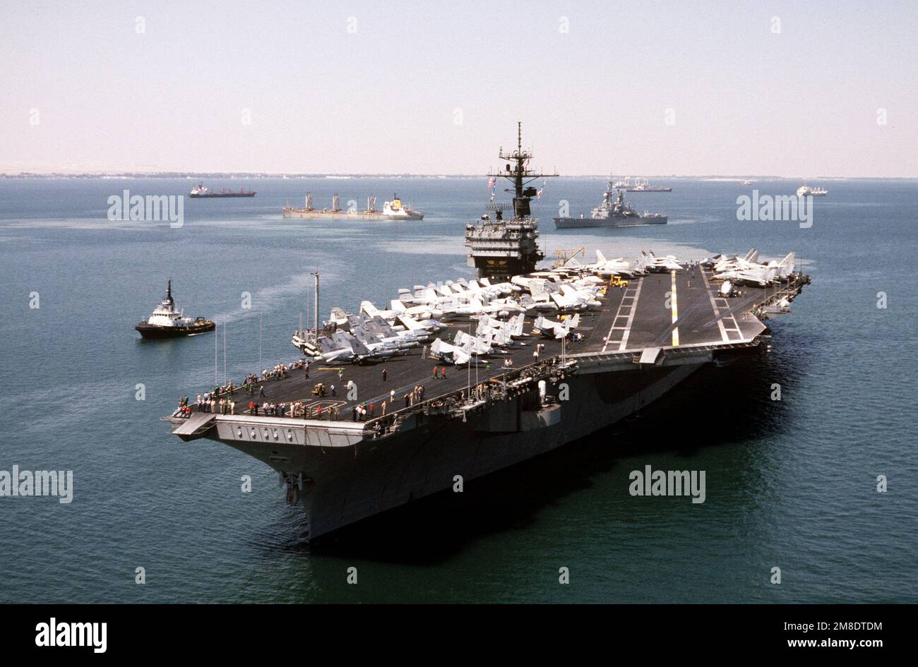 A port bow view of the aircraft carrier USS JOHN F. KENNEDY (CV-67) as ...