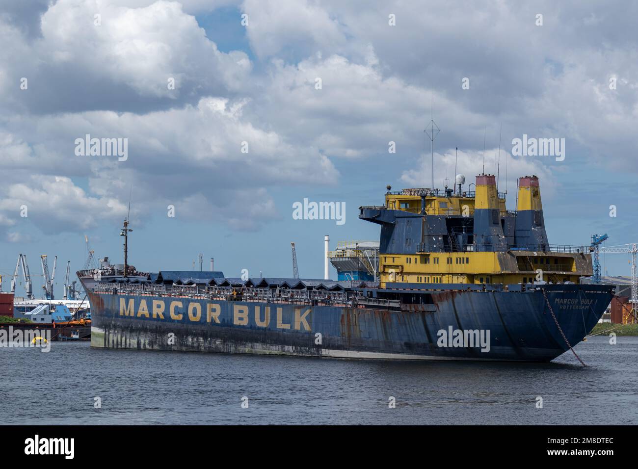 Port of Rotterdam scene with the permanently berthed storage vessel ...