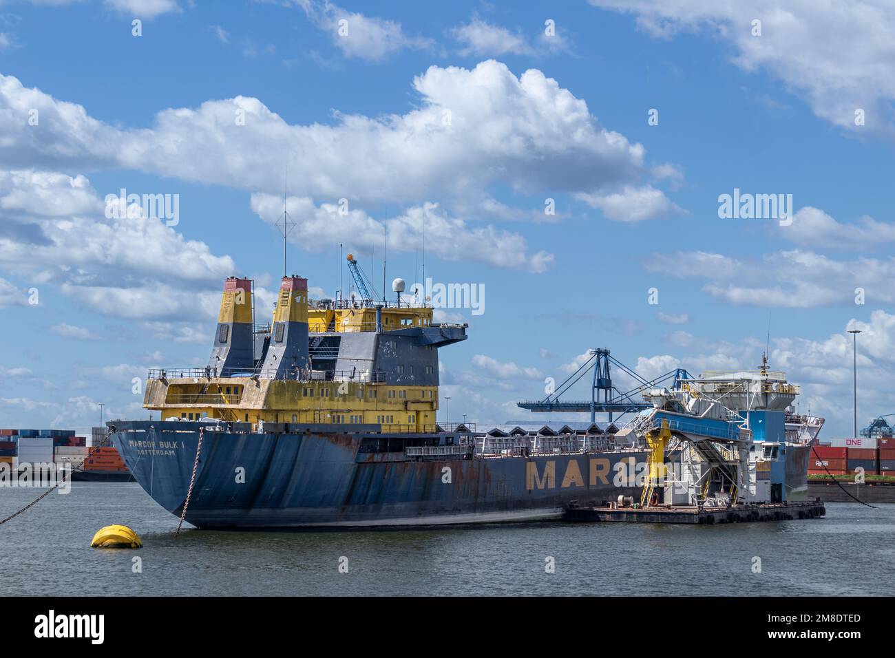 Port of Rotterdam scene with the permanently berthed storage vessel ...
