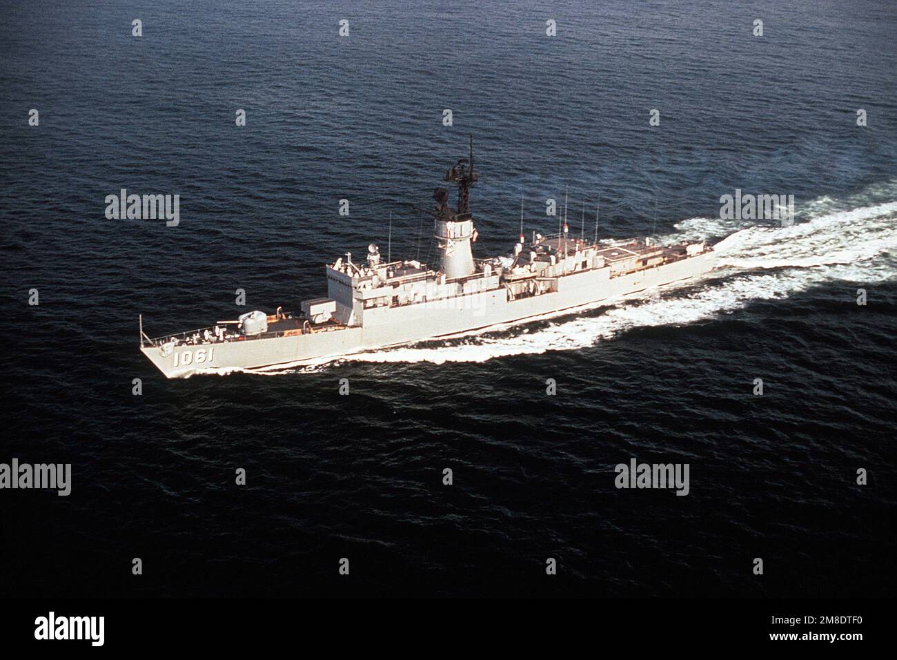 A port view of the frigate USS PATTERSON (FF-1061) underway. Base ...