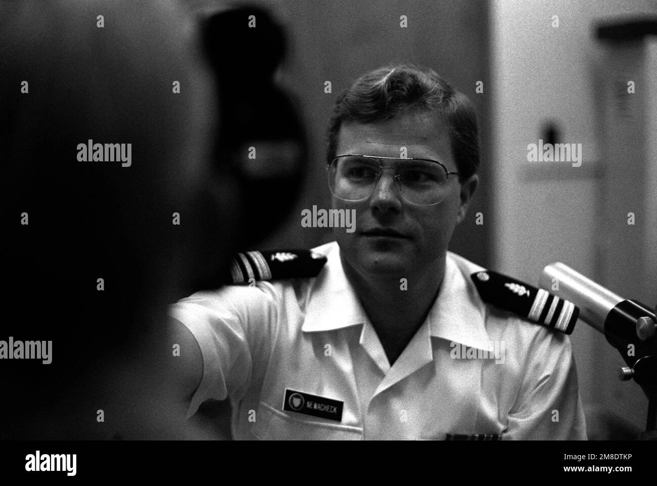 Lieutenant Commander James Newacheck, an optometrist with the Submarine ...