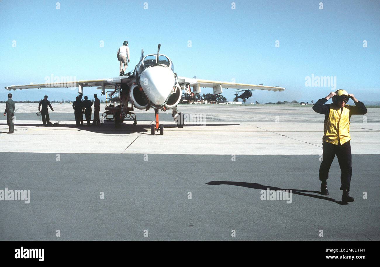 Members of a helicopter support team stand by as a Helicopter Combat ...