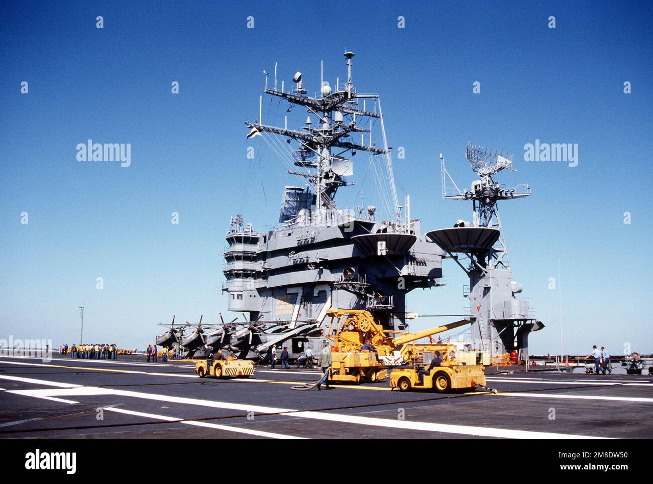 Crew members position MD-3A tow tractors to test the tension level of ...