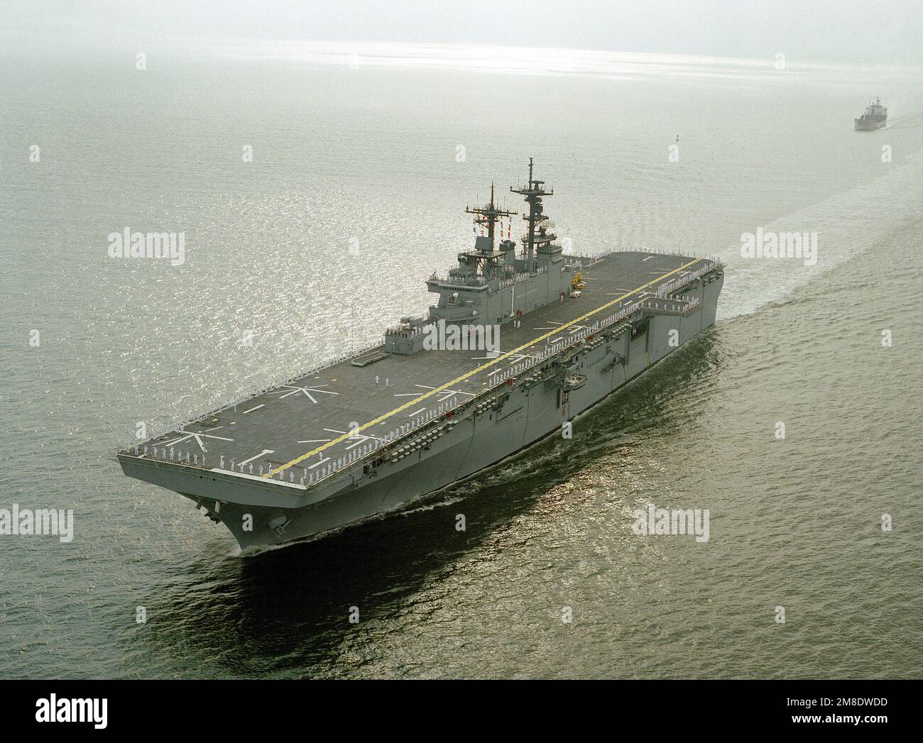 A port bow view of the amphibious assault ship USS WASP (LHD 1 ...